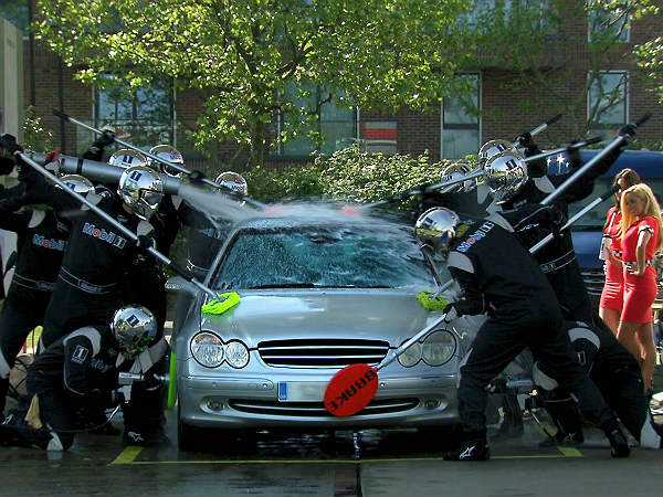 Mobil 1 Car Wash: F1 Pit Crew & Jenson Button At Car Washing Station ...