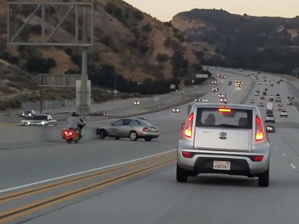 Video: Did The Biker’s Kick Cause The Cars To Crash? - DriveSpark