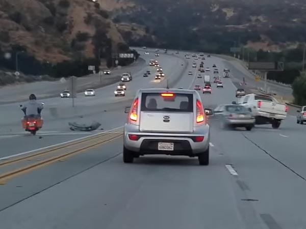 Video: Did The Biker’s Kick Cause The Cars To Crash? - DriveSpark