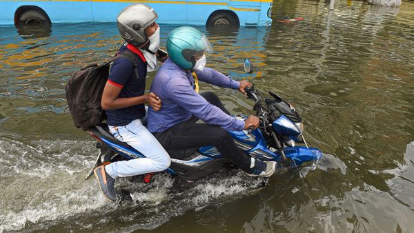 Protecting Two-Wheelers From Monsoon Waterlogging Damage - DriveSpark News